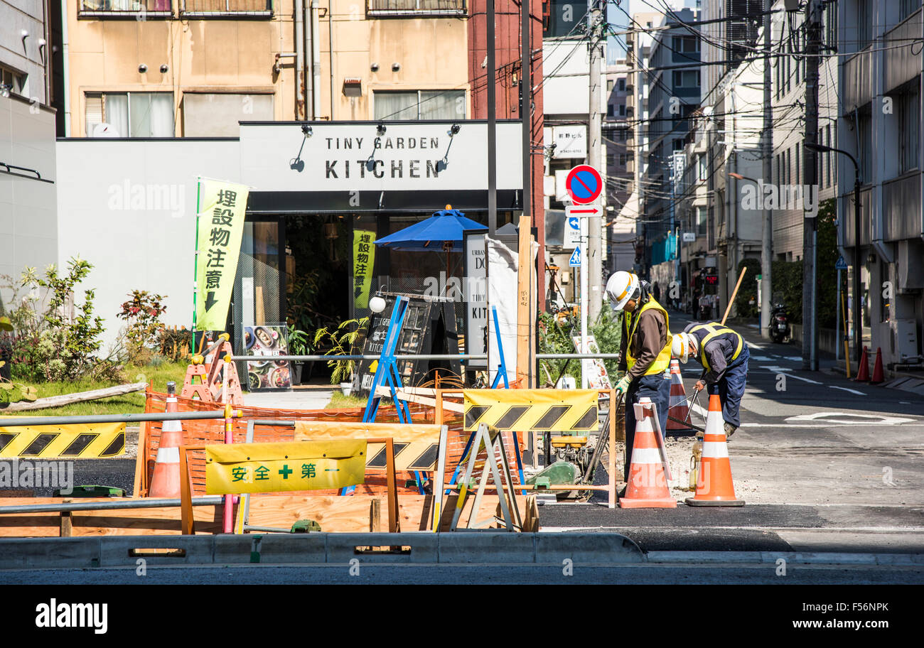 Workers at road construction site,Minato-Ku,Tokyo,Japan Stock Photo - Alamy