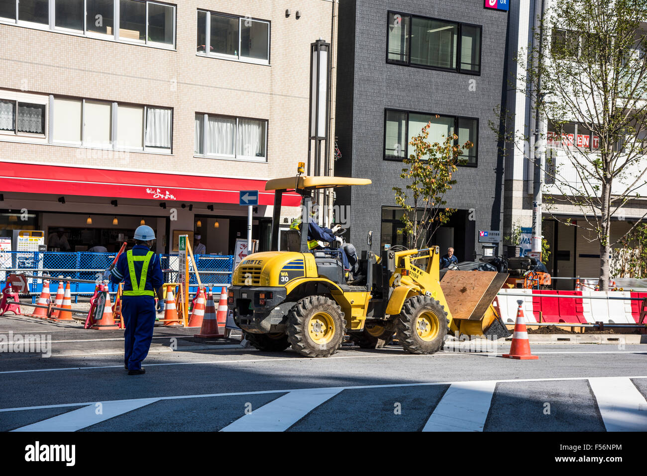 Workers at road construction site,Minato-Ku,Tokyo,Japan Stock Photo - Alamy