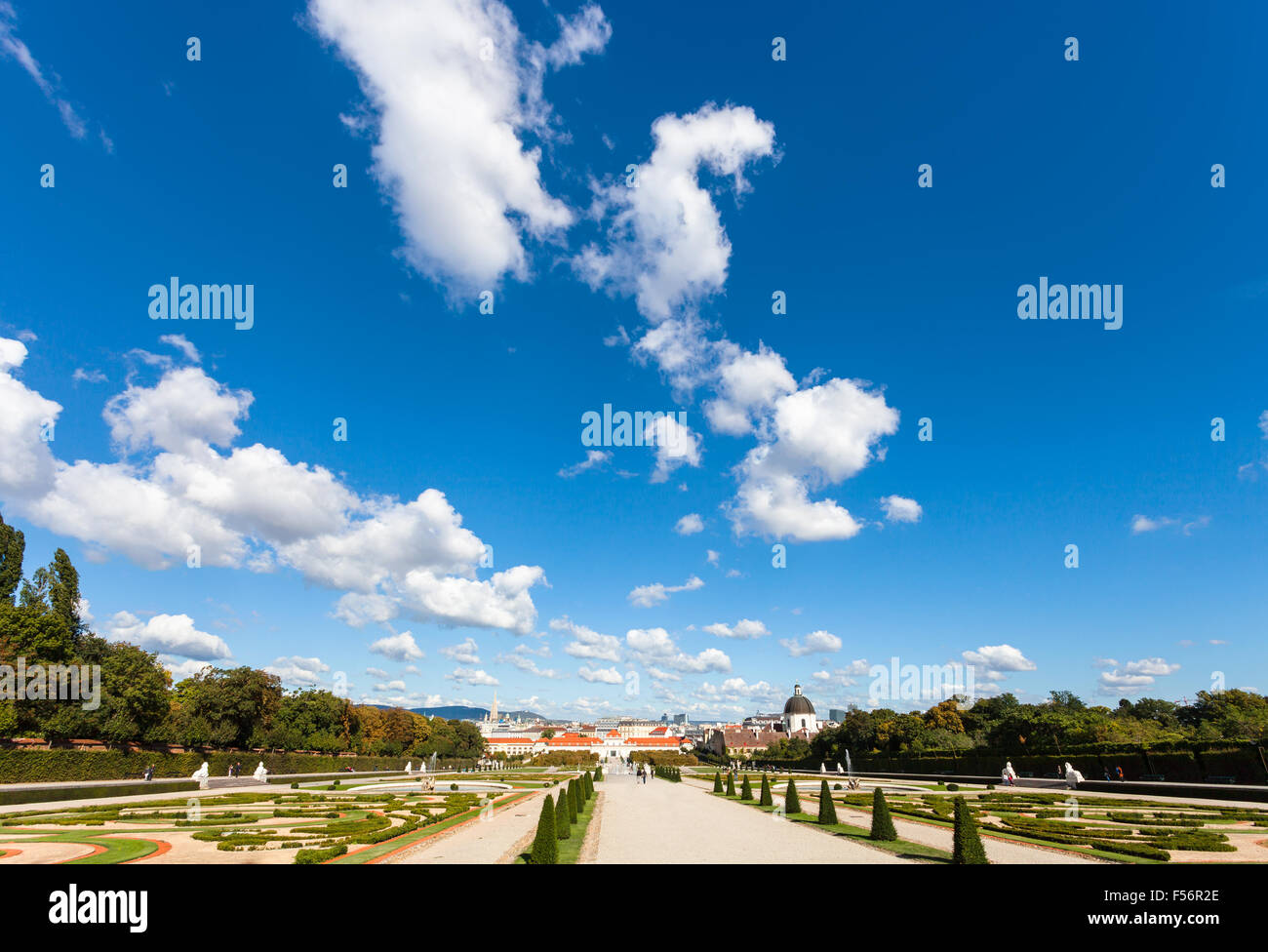 travel to Vienna city - blue sky with white clouds over gardens of ...