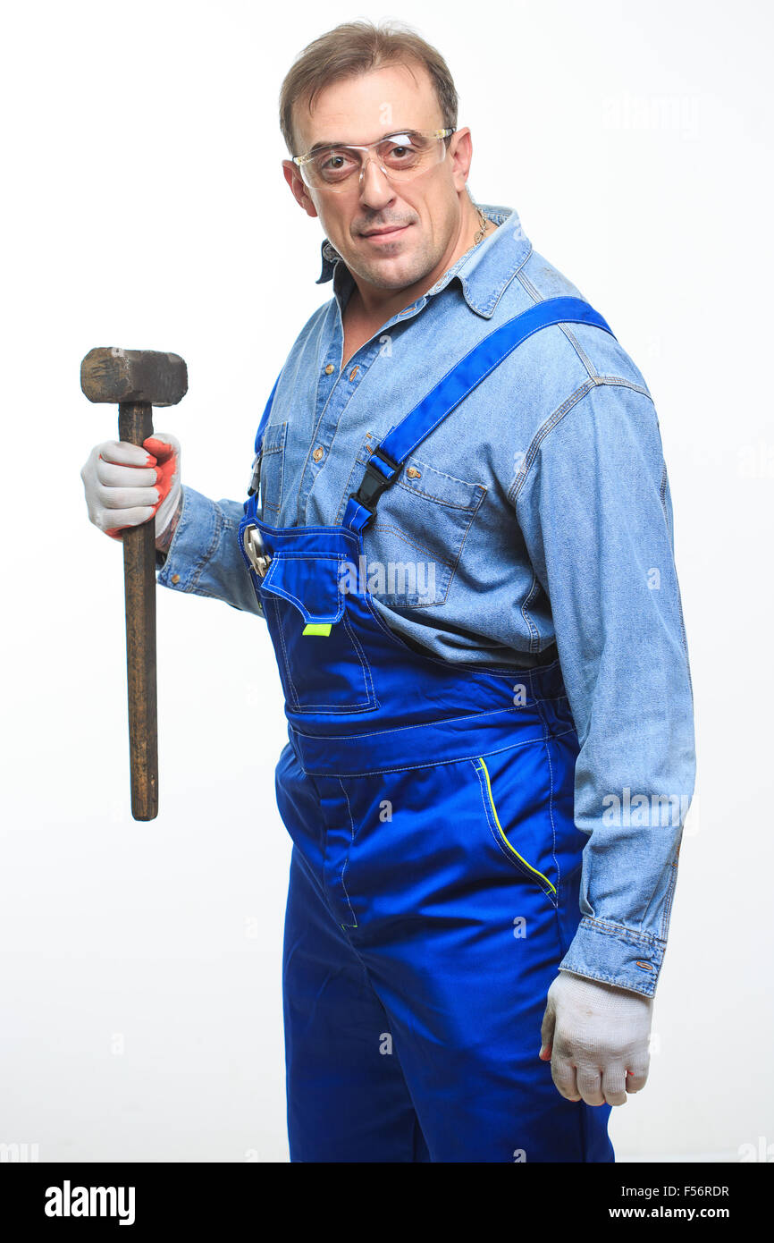 mechanic holding a hammer Stock Photo - Alamy
