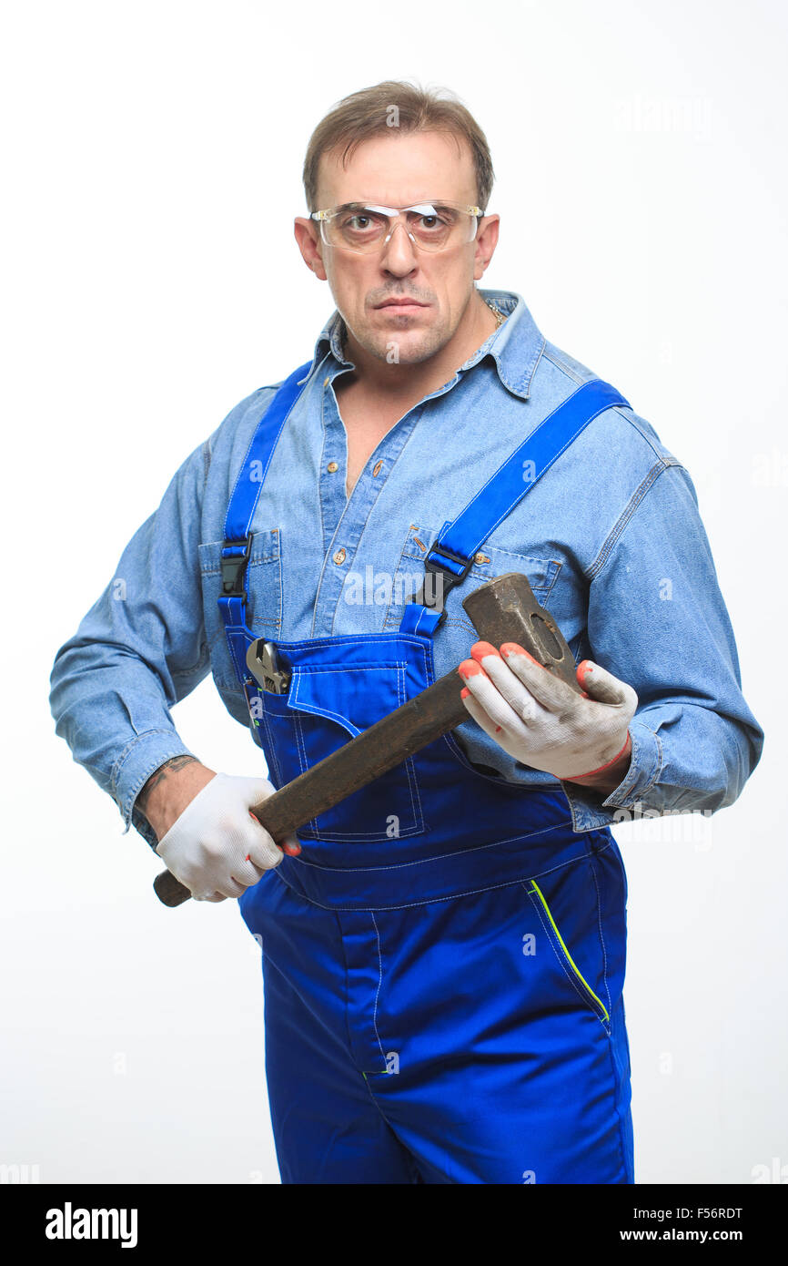 mechanic holding a hammer Stock Photo - Alamy