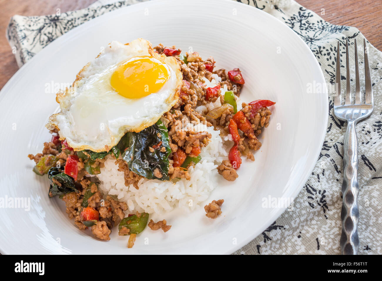 Thai version of loco moco made with rice, a spicy meat and vegetable ...