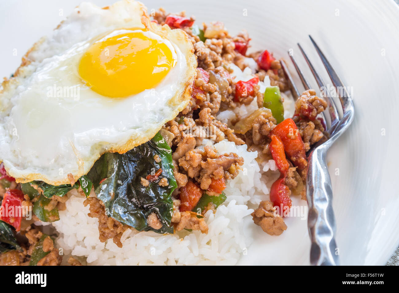 Thai version of loco moco made with rice, a spicy meat and vegetable ...