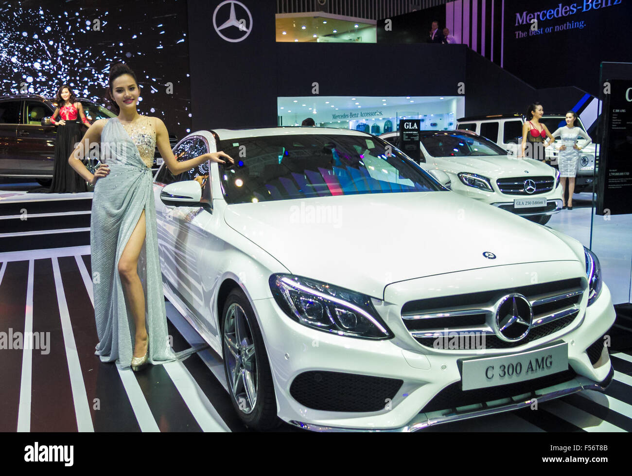 Ho Chi Minh City, Vietnam. 28th Oct, 2015. Models pose beside cars ...