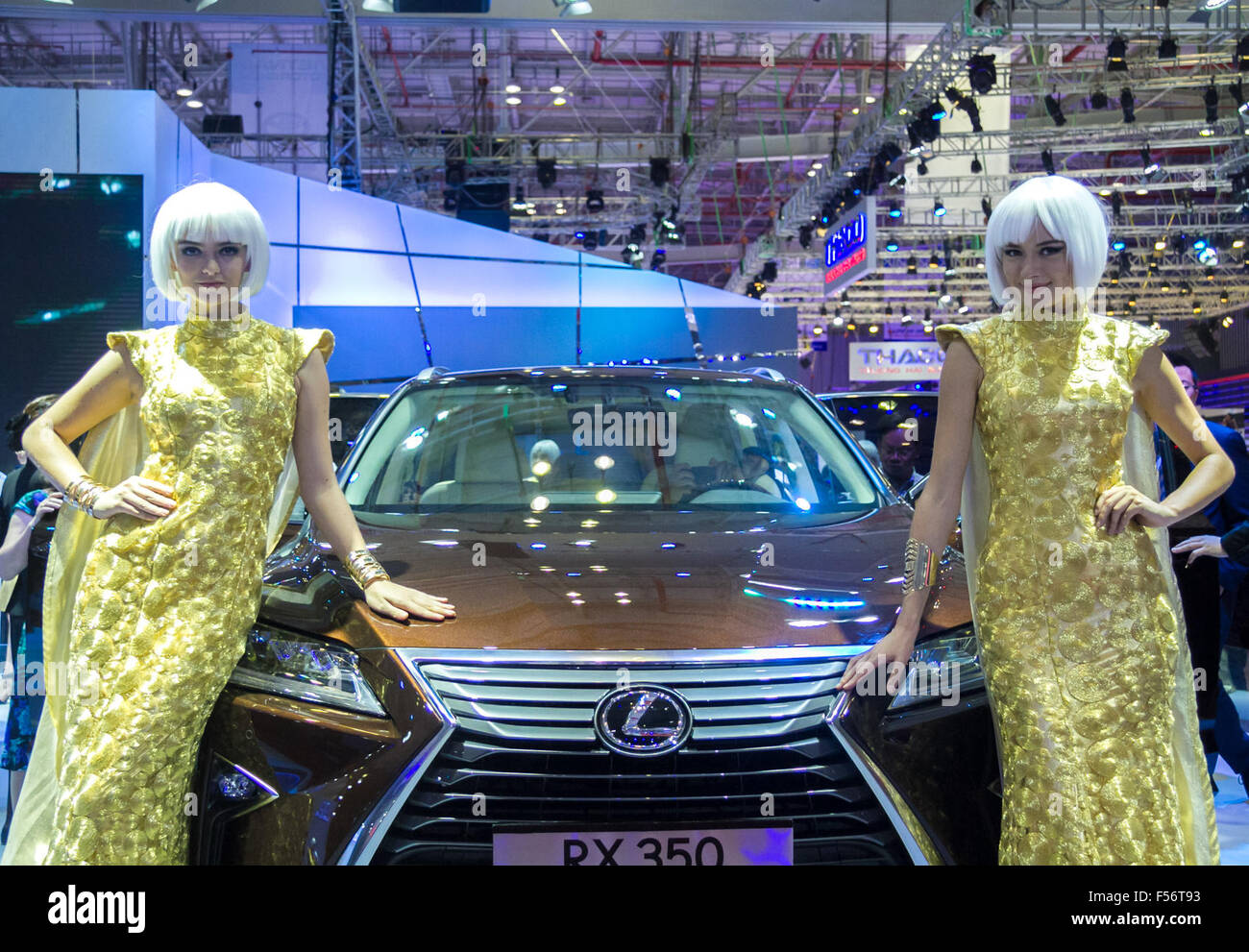 Ho Chi Minh City, Vietnam. 28th Oct, 2015. Models pose beside a car ...