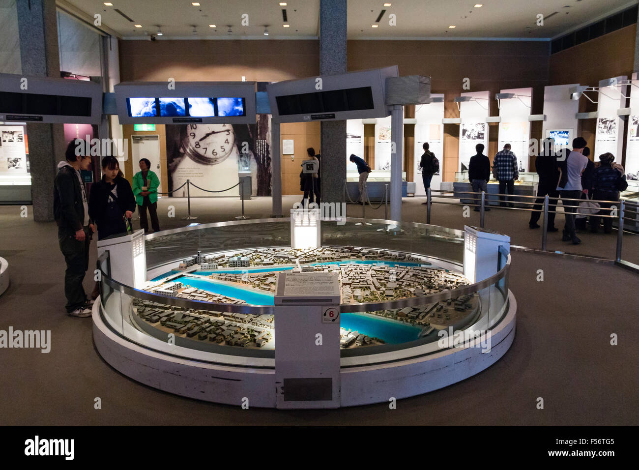 Japan, Hiroshima. Interior, Atomic-Bomb museum, first hall. Tourists ...