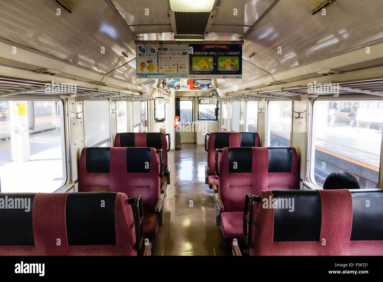 Japanese railways. Interior view of commuter railway carriage with ...