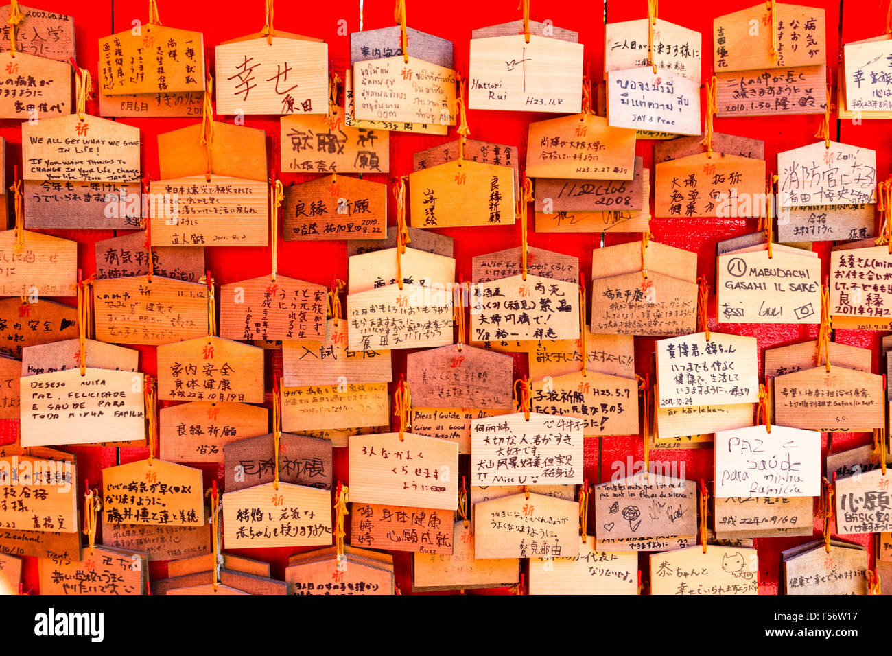 Inuyama castle, shrine, ema boards hanging on frame against red ...