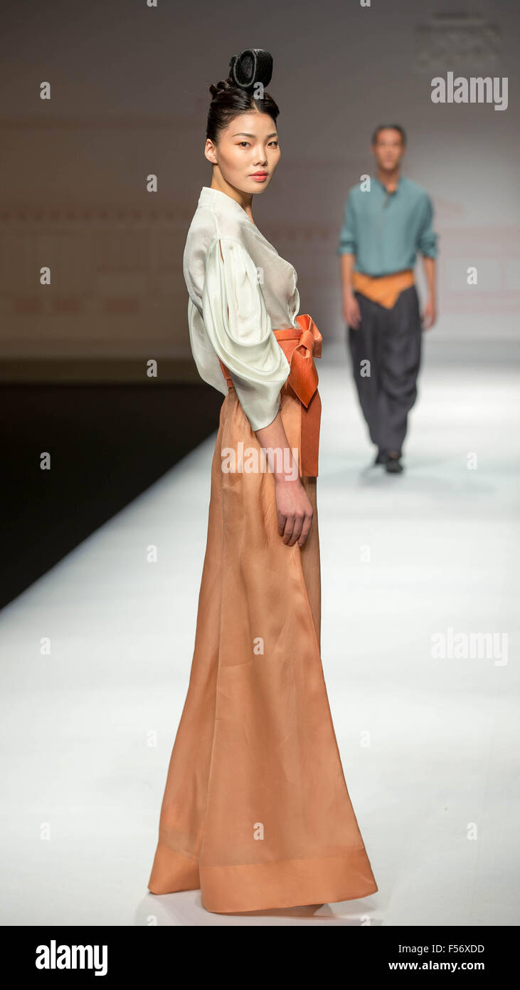 Beijing, China. 28th Oct, 2015. A model presents a creation designed by ...
