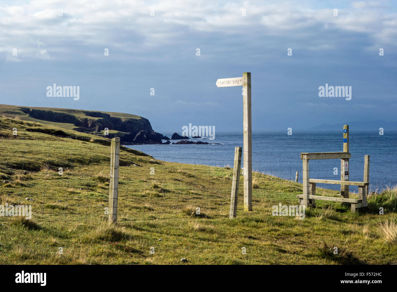 View of coastal path and stile at the Dale of Walls, Mainland Shetland ...