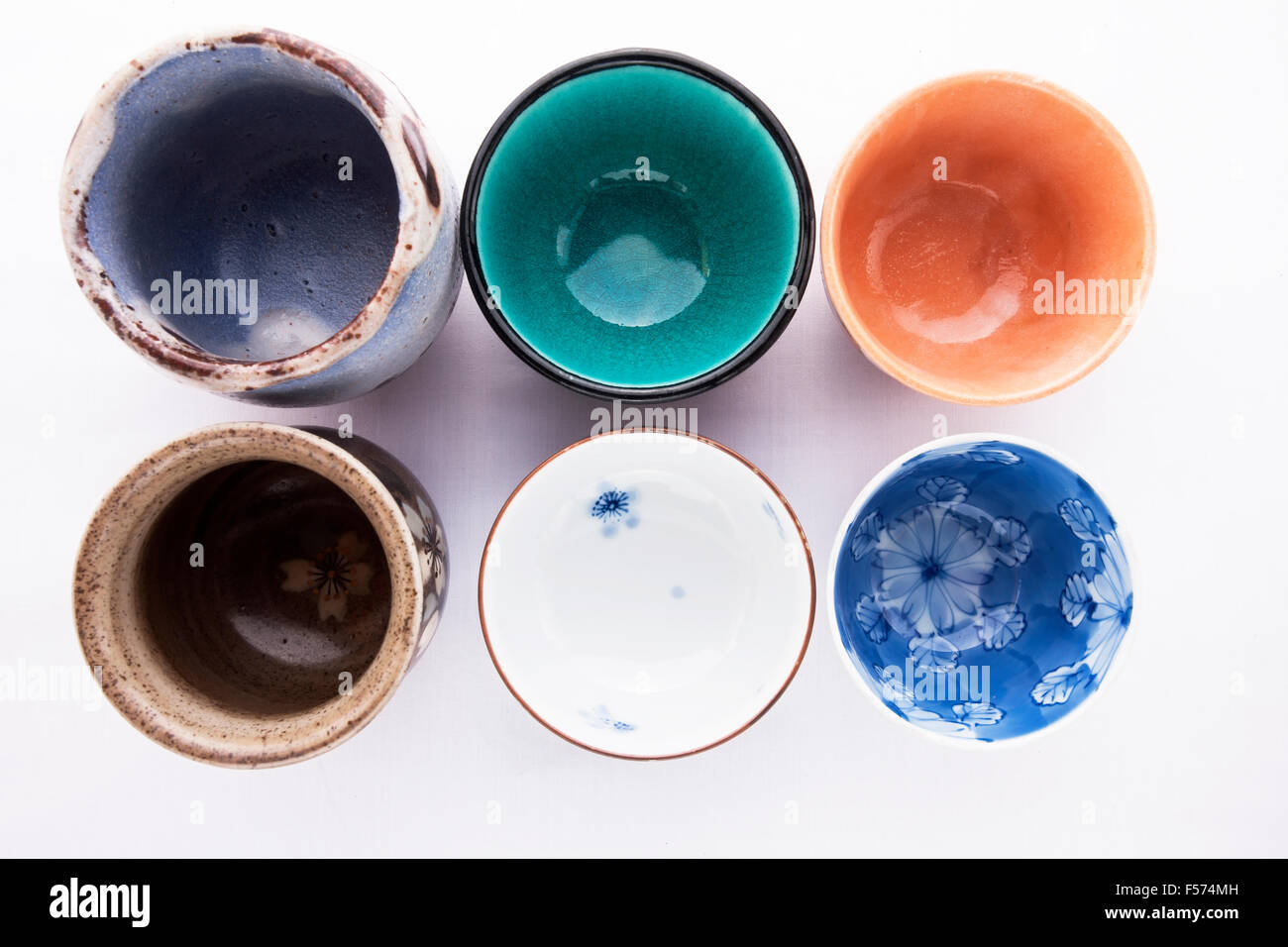 Collection of traditional Japanese pottery isolated on white background ...