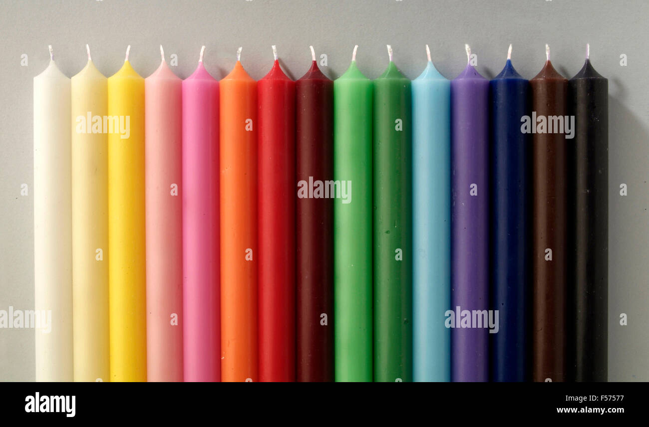 group of colorful cylindrical candles on a white background Stock Photo ...