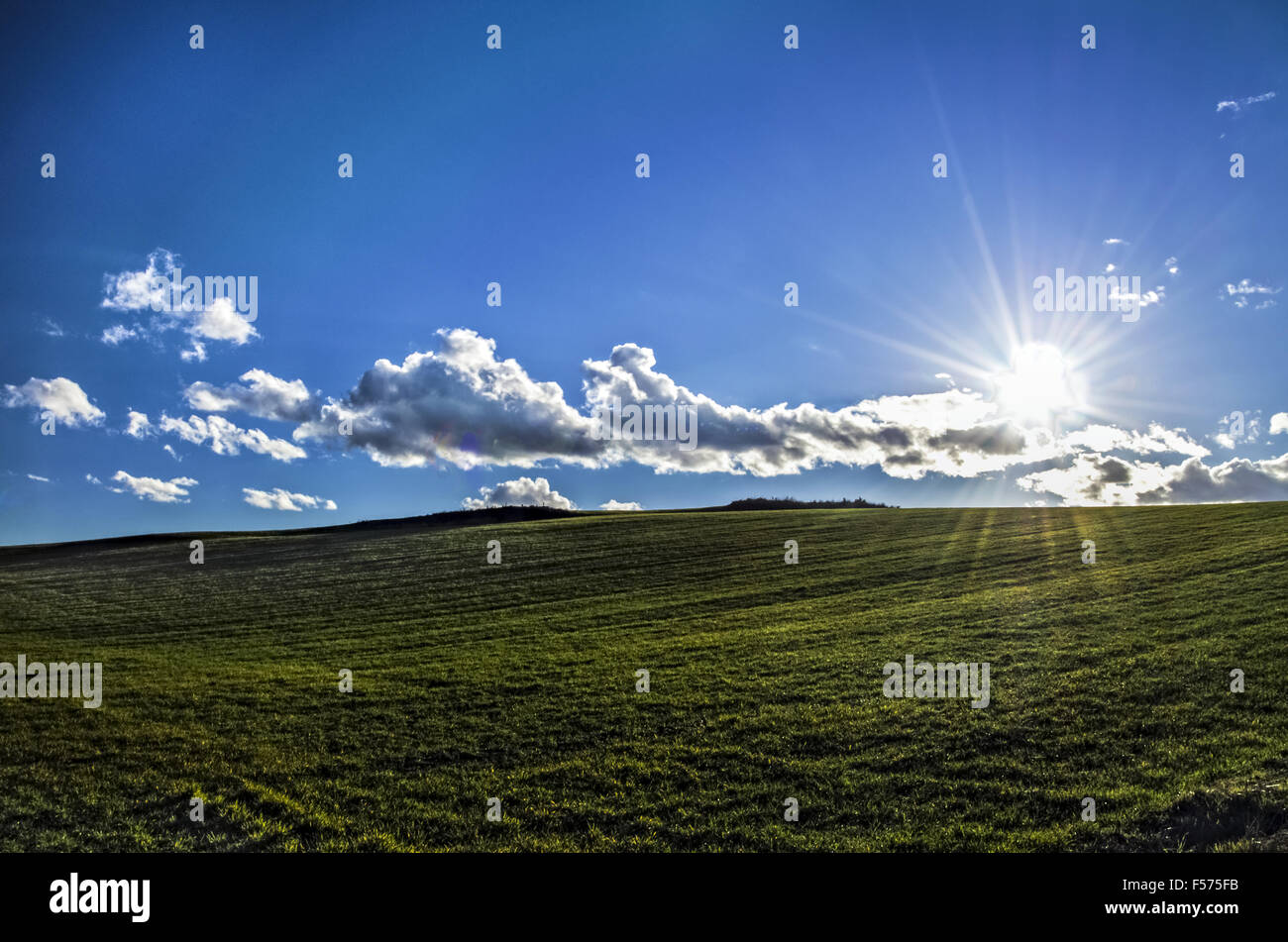 Beautiful sun, shining over the valley Stock Photo - Alamy