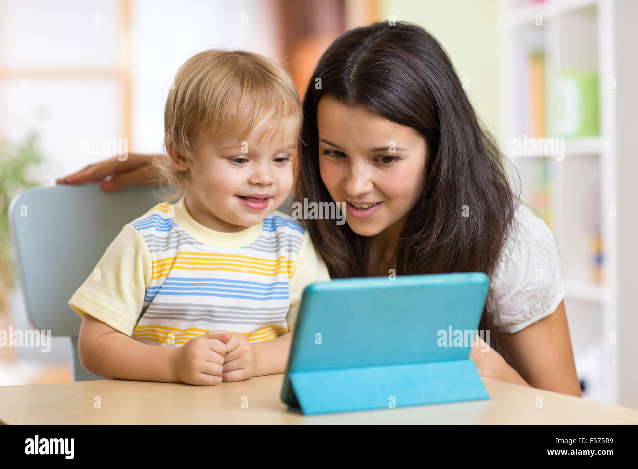 Mother son playing computer game hi-res stock photography and images ...