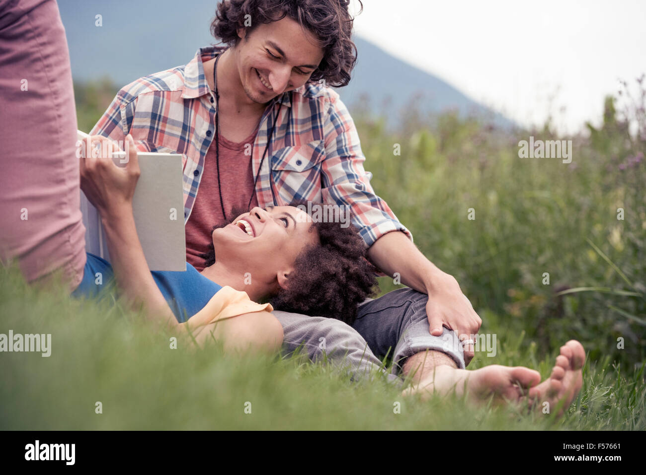 Woman lying down looking up hi-res stock photography and images - Alamy