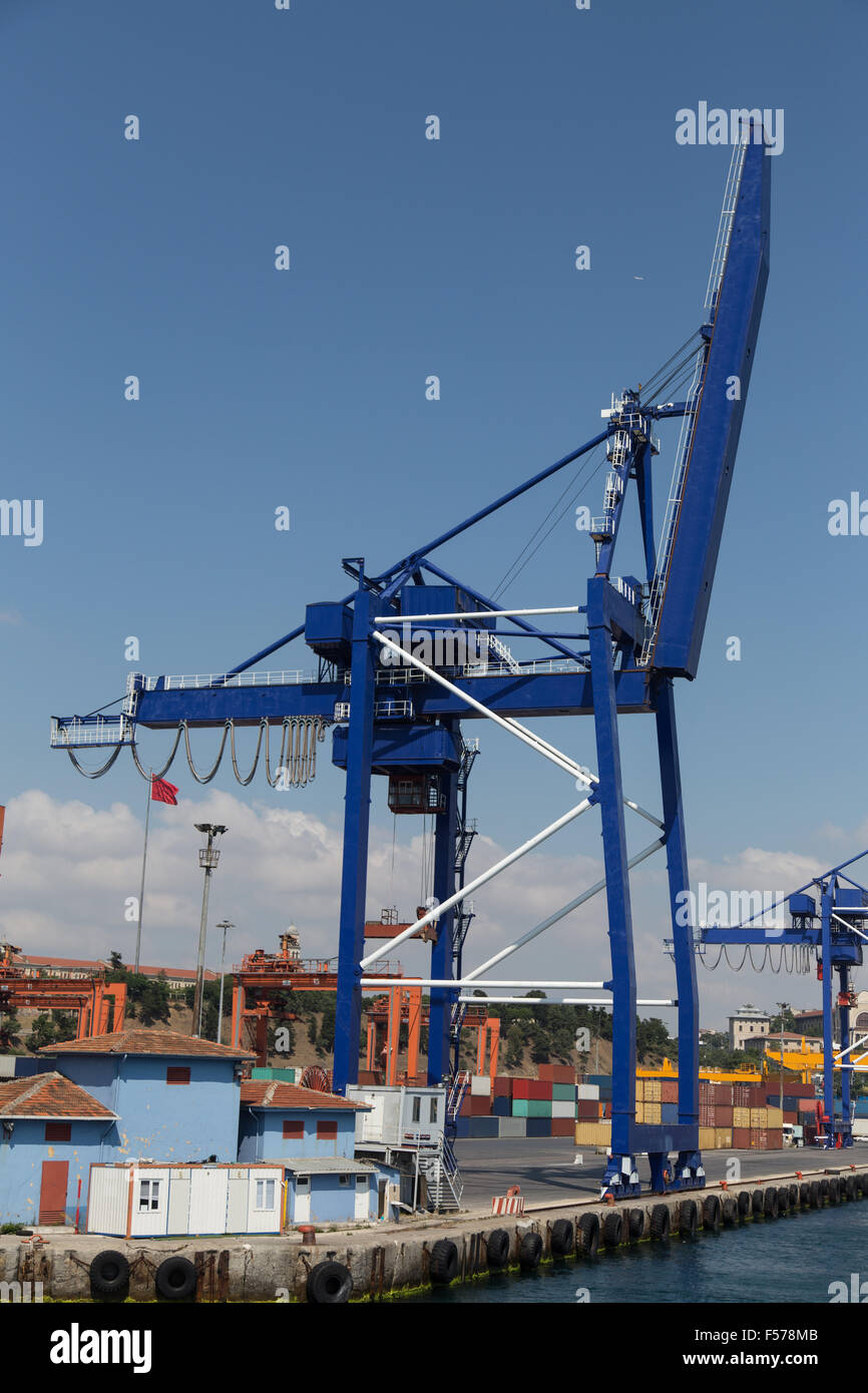 Blue Port Crane in a sea port Stock Photo - Alamy