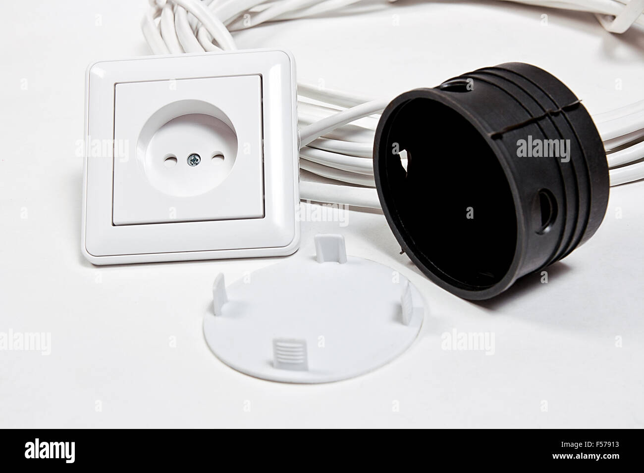 Electric wall socket, socket box, power cable on white background Stock ...