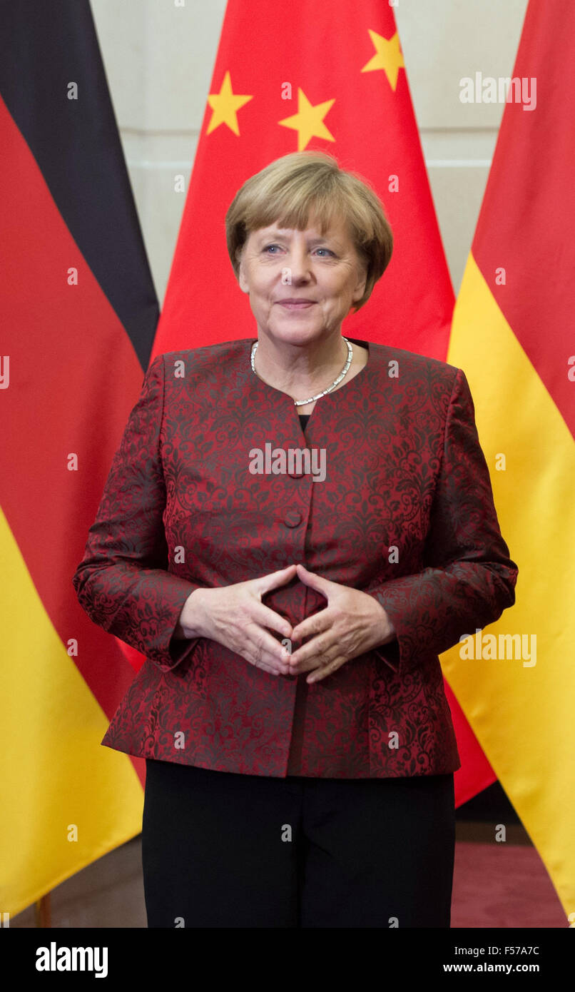Beijing, China. 29th Oct, 2015. German Chancellor Angela Merkel stands ...