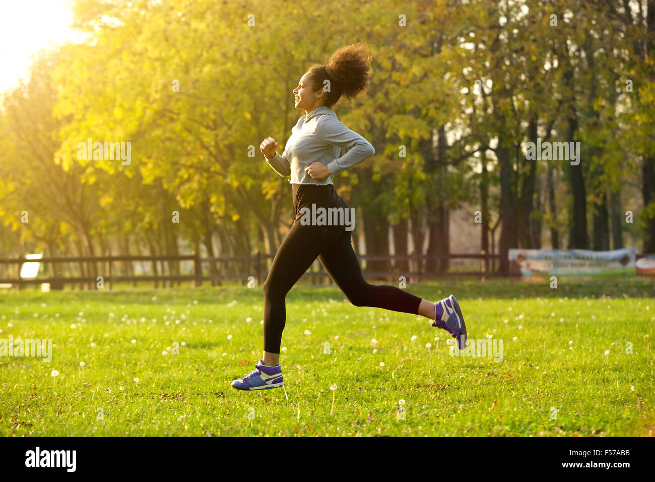 Side profile of a girl running hi-res stock photography and images - Alamy