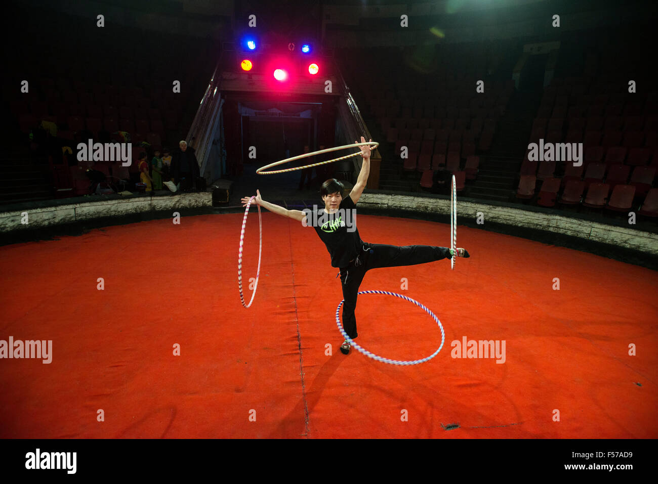 Performance of children circus studio actor with hoops at arena of ...