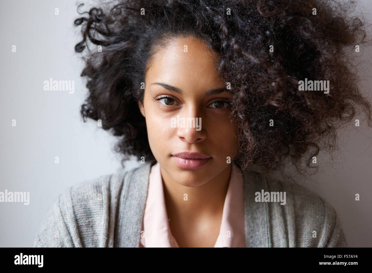 Close up portrait of an attractive young african american woman looking ...