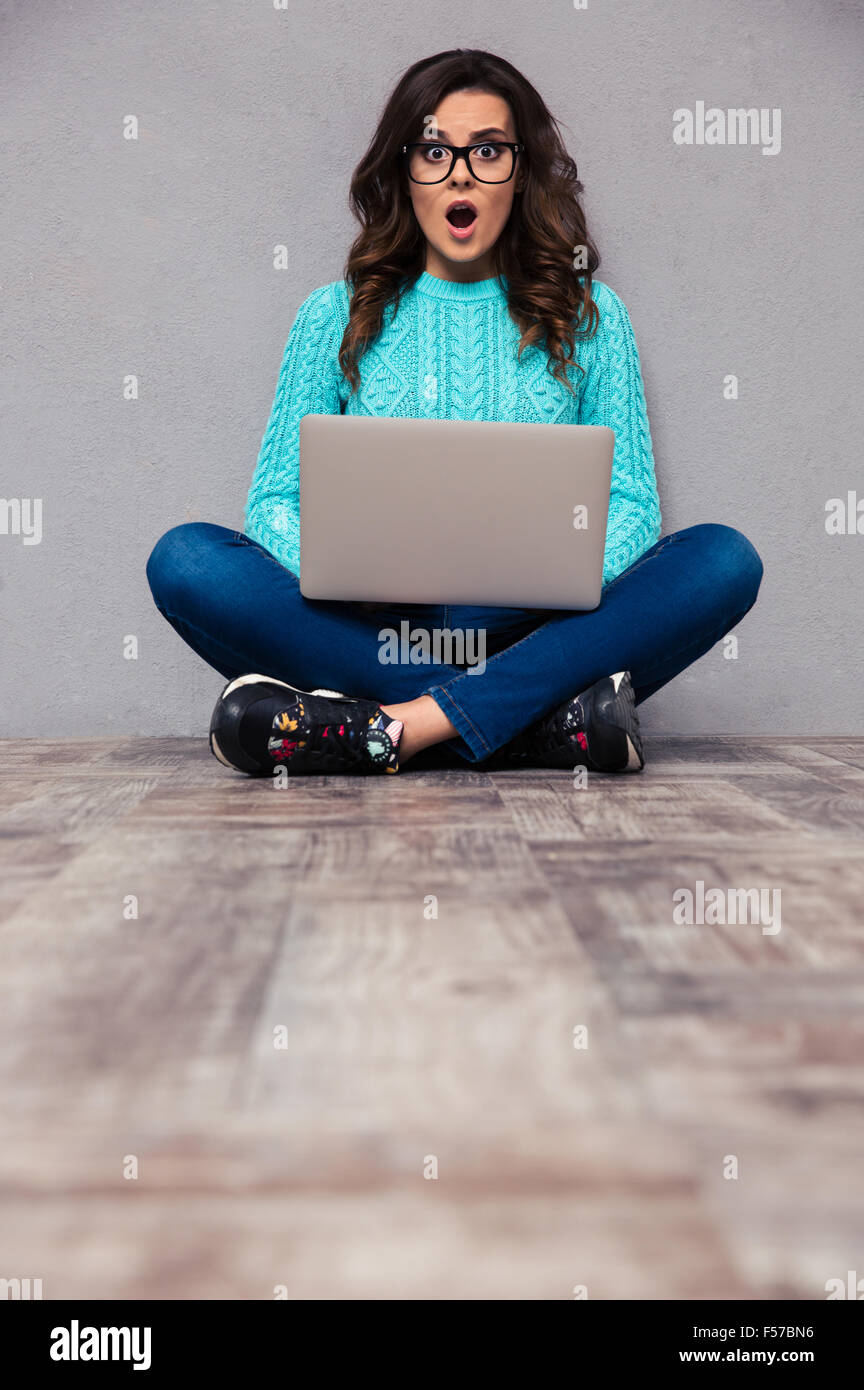 Amazed woman shocked laptop isolated hi-res stock photography and ...