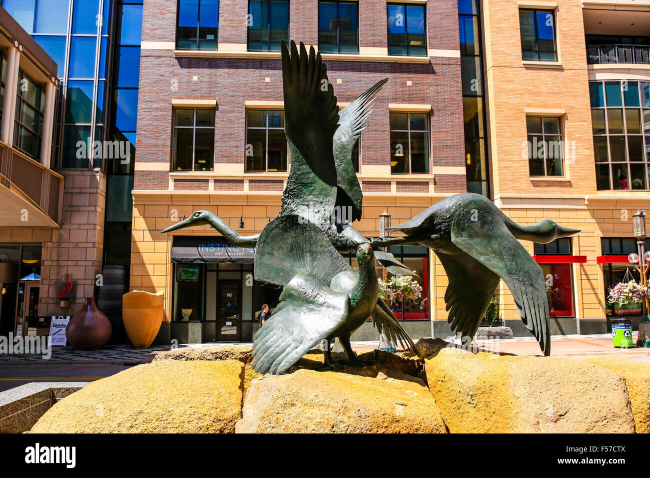 Bronze sculptures of the Great Blue Heron by Elliot Offner in downtown ...