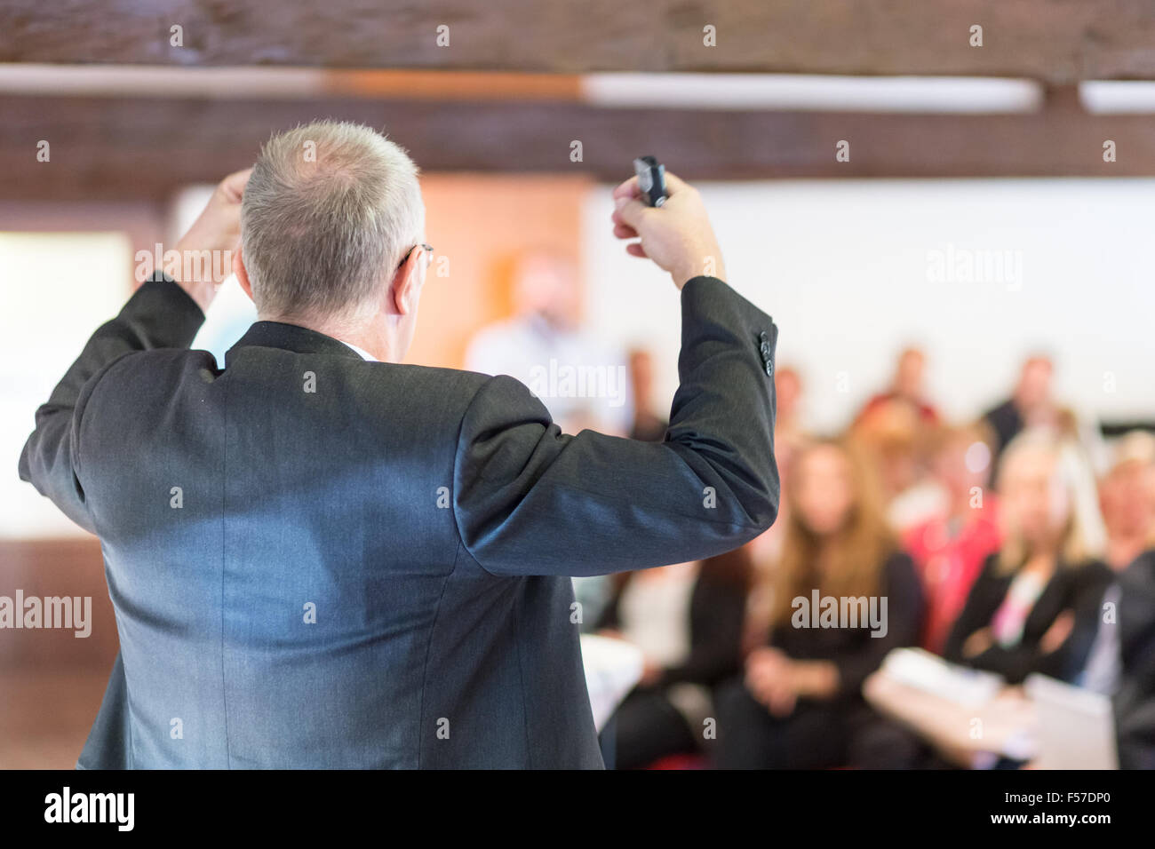 Business people making presentation senior hi-res stock photography and ...