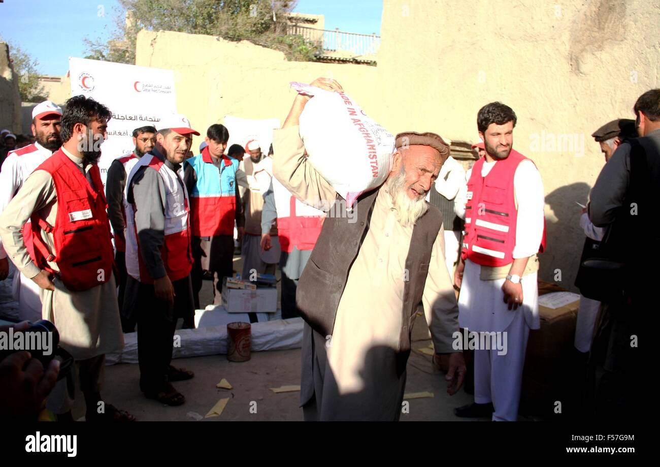 Jalalabad. 29th Oct, 2015. Afghan Red Crescent volunteers distribute ...