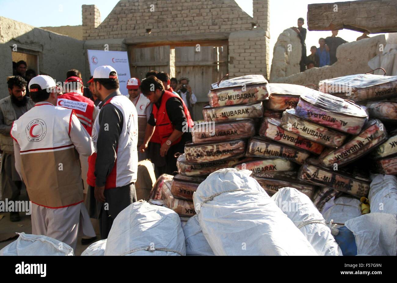 Jalalabad. 29th Oct, 2015. Afghan Red Crescent volunteers distribute ...
