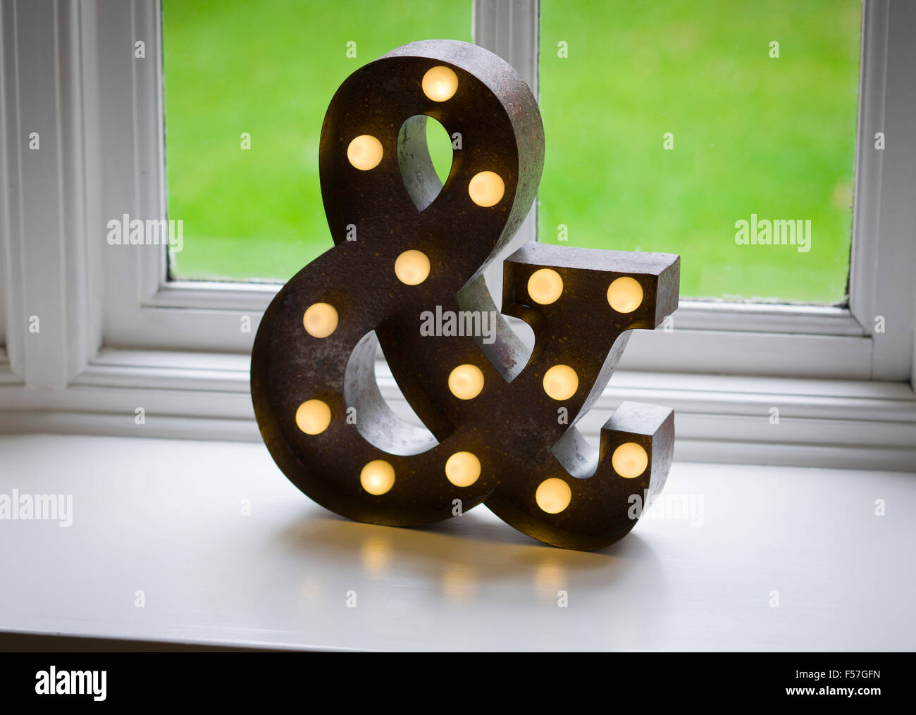 Ampersand symbol or logogram with LED lightbulbs Stock Photo - Alamy