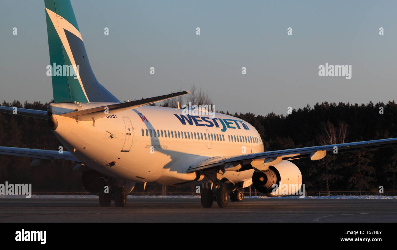 Boeing 737-700 C-GWBT WestJet on the runway at YOW Ottawa Canada ...