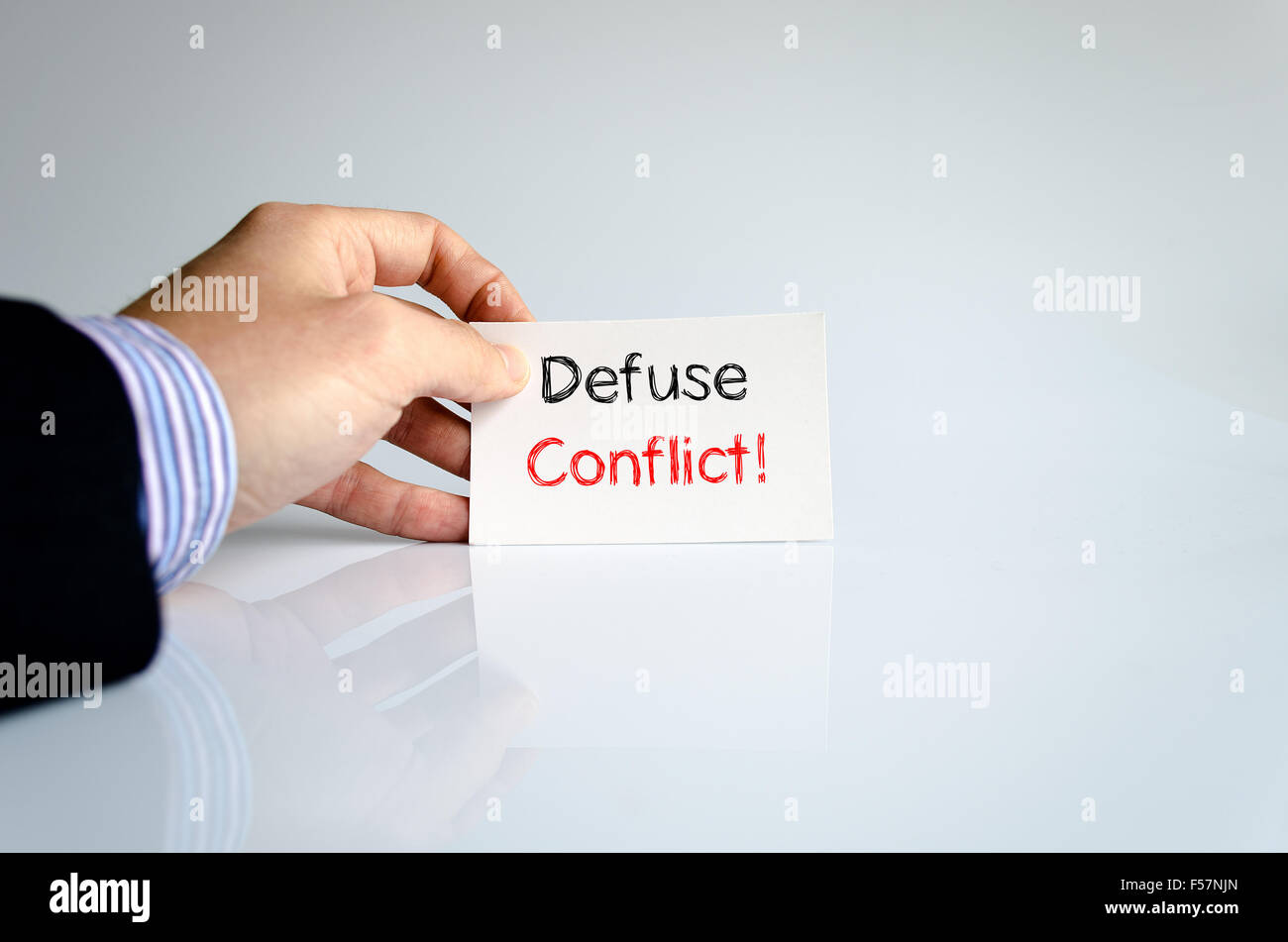 Defuse conflict text concept isolated over white background Stock Photo ...
