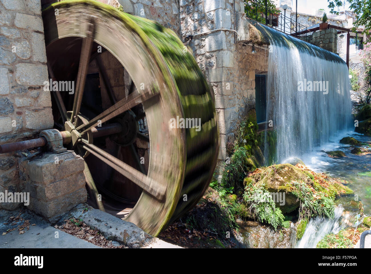 Old water mill near artificial waterfall in Livadeia, Greece Stock ...