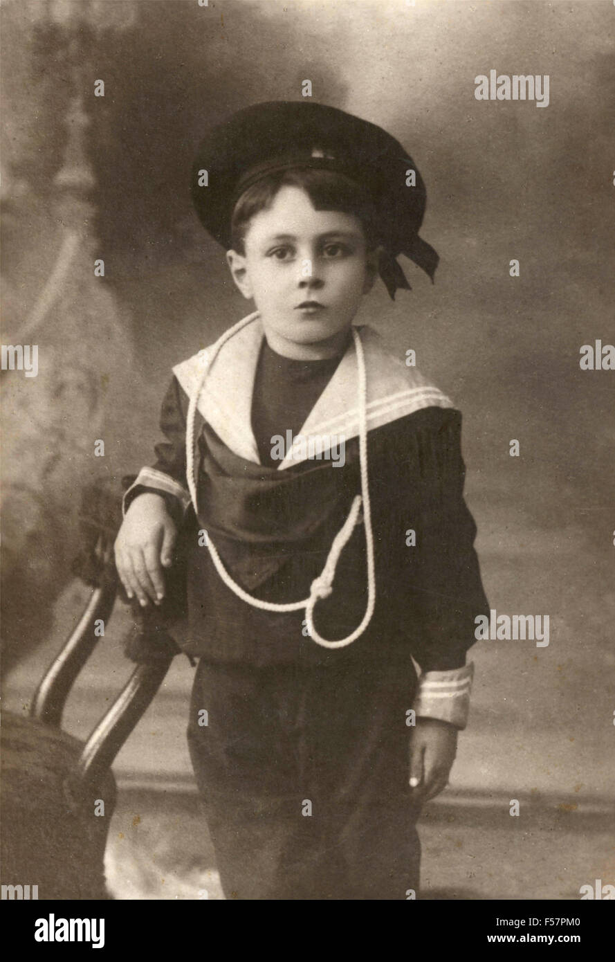 Portrait of a child dressed as a sailor, Italy Stock Photo - Alamy