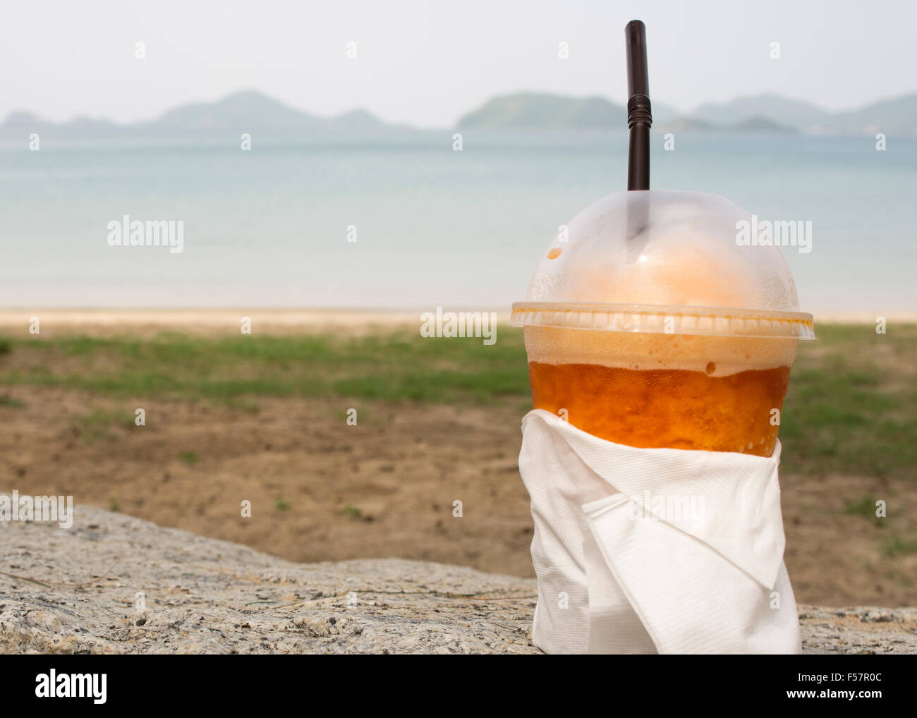 vacation ocean pot drink sand escape holiday Stock Photo - Alamy