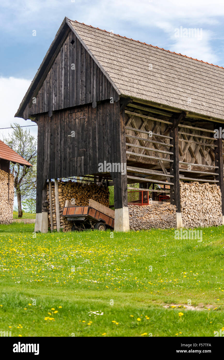 Wood storage warehouse in Loški Potok, Ribnica, Slovenia Stock Photo ...
