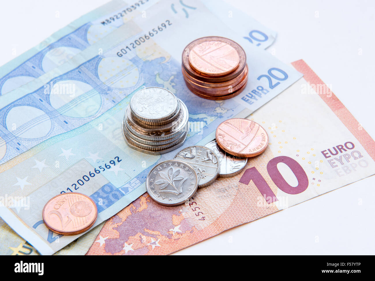 Euro Notes And Sterling Coins High Resolution Stock Photography and ...