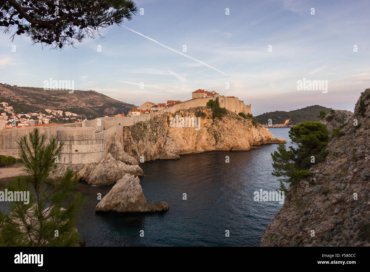City Walls on a steep cliff at the Old Town in Dubrovnik, Croatia, at ...