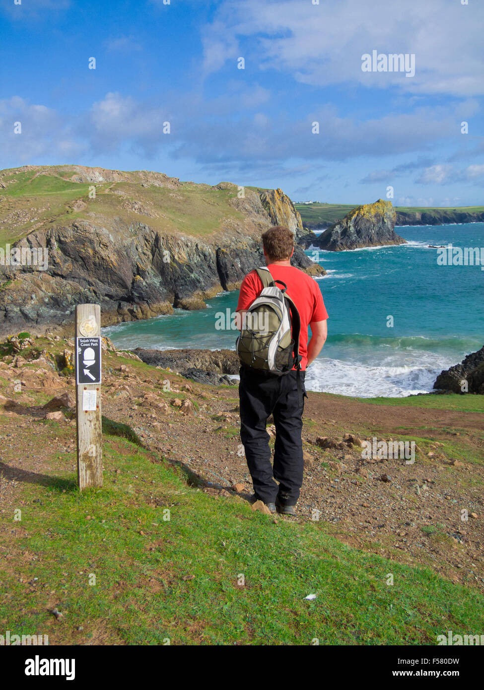 Walker Walking the South West Coast Path at Kynance Cove The Lizard ...