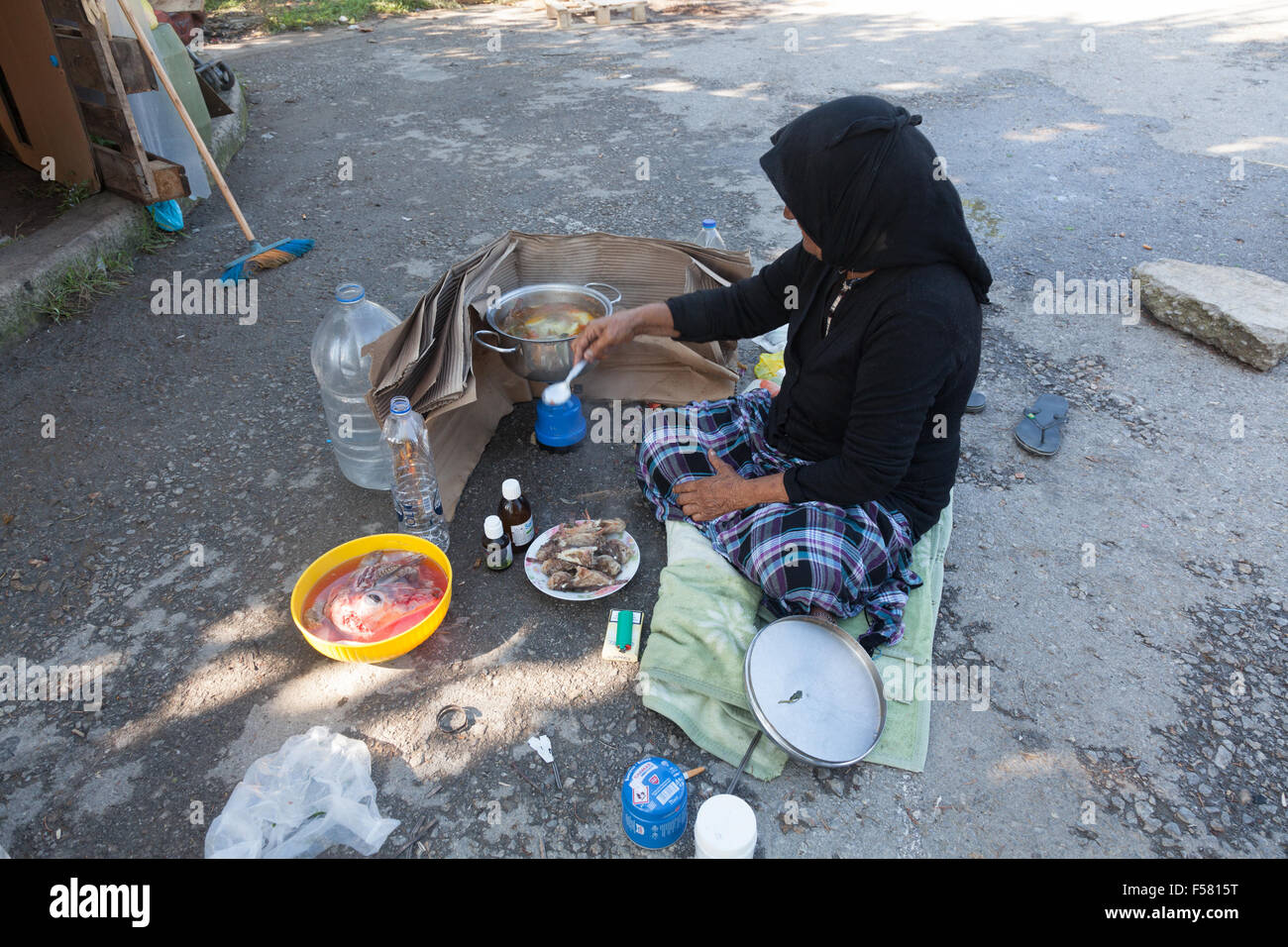 Greek gypsy living in self-constructed tent on a parking in Kos, Greece ...