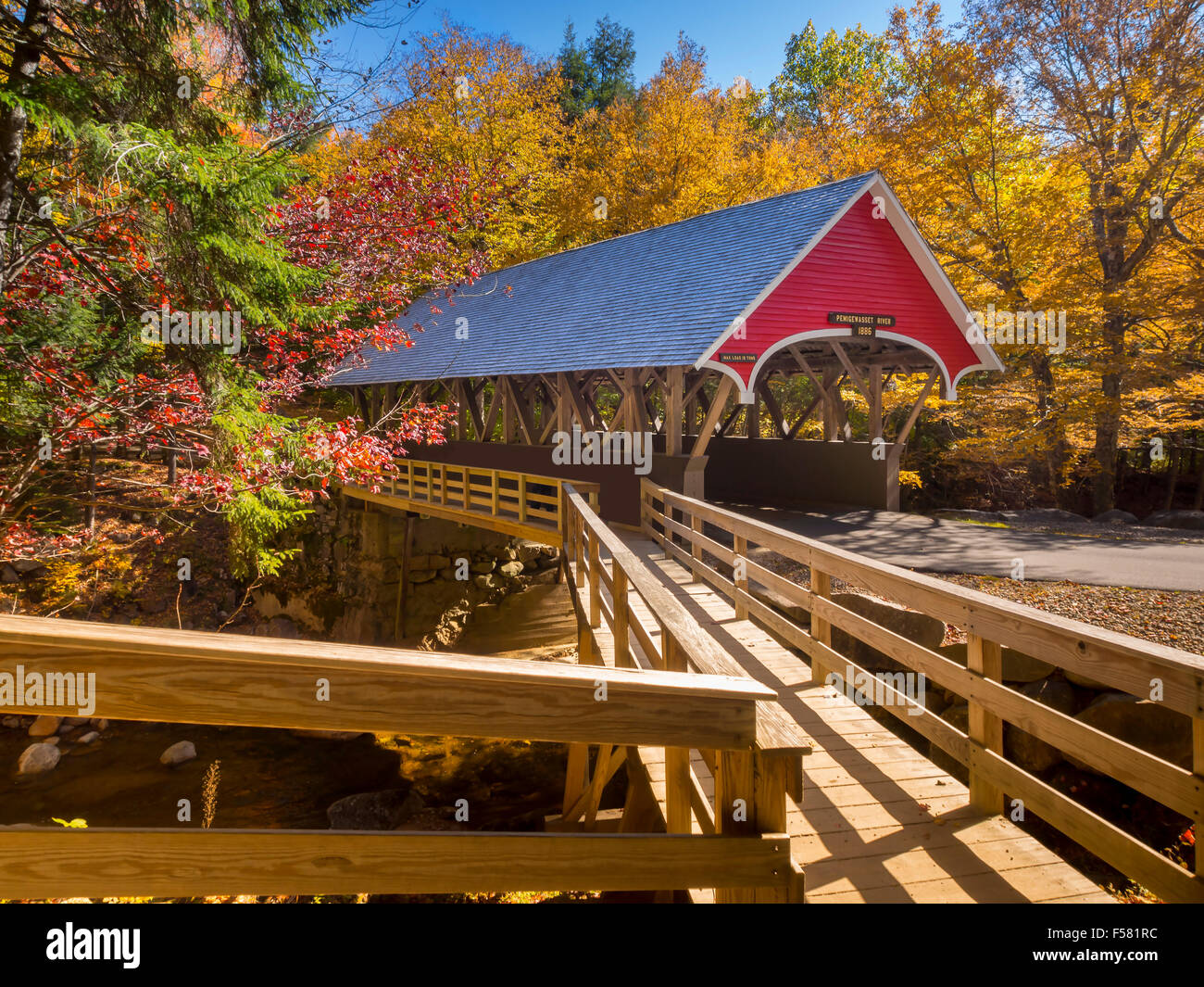 Red covered bridge in Fanconia New Hampshire during Fall season Stock ...