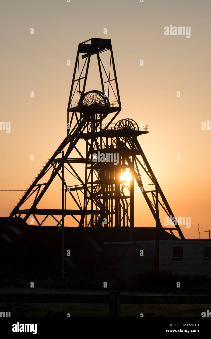The sun sets at the old South Crofty tin mine near Camborne in Cornwall ...