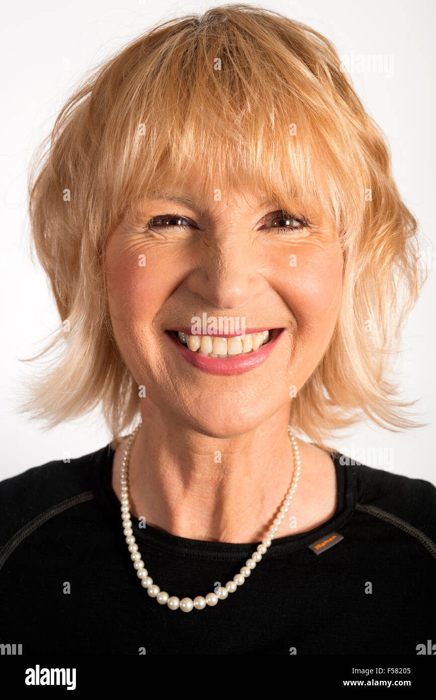 Middle-aged woman laughing Stock Photo - Alamy