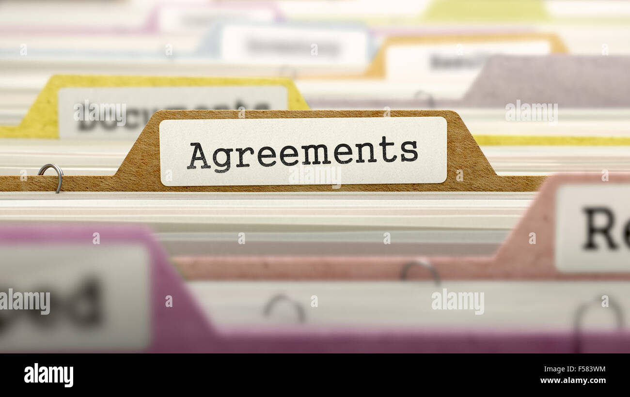 File Folder Labeled as Agreements in Multicolor Archive. Closeup View ...