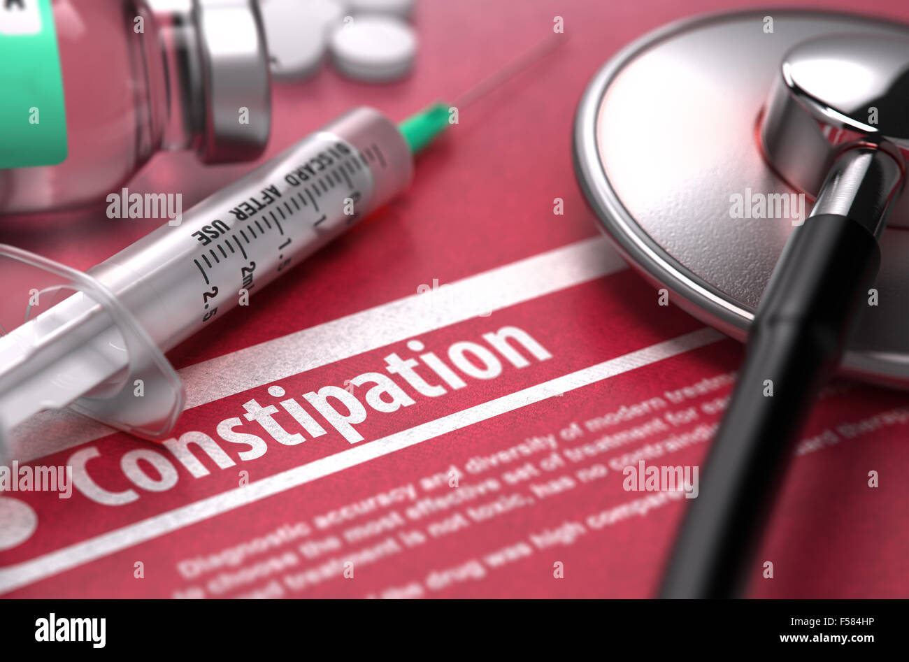 Constipation - Medical Concept on Red Background with Blurred Text and ...