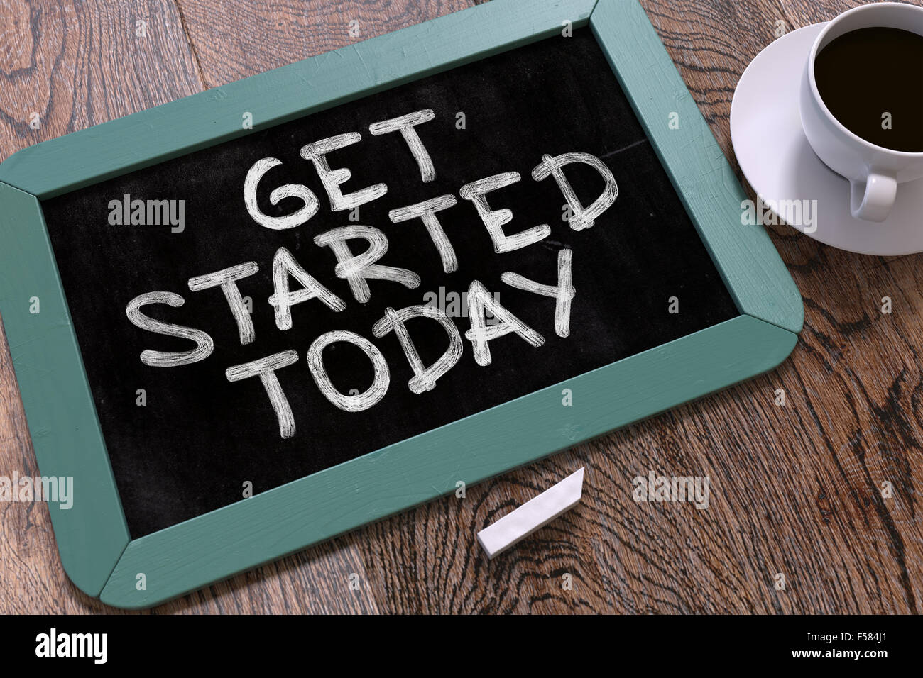 Get Started Today - Inspirational Quote Handwritten by White Chalk on a ...