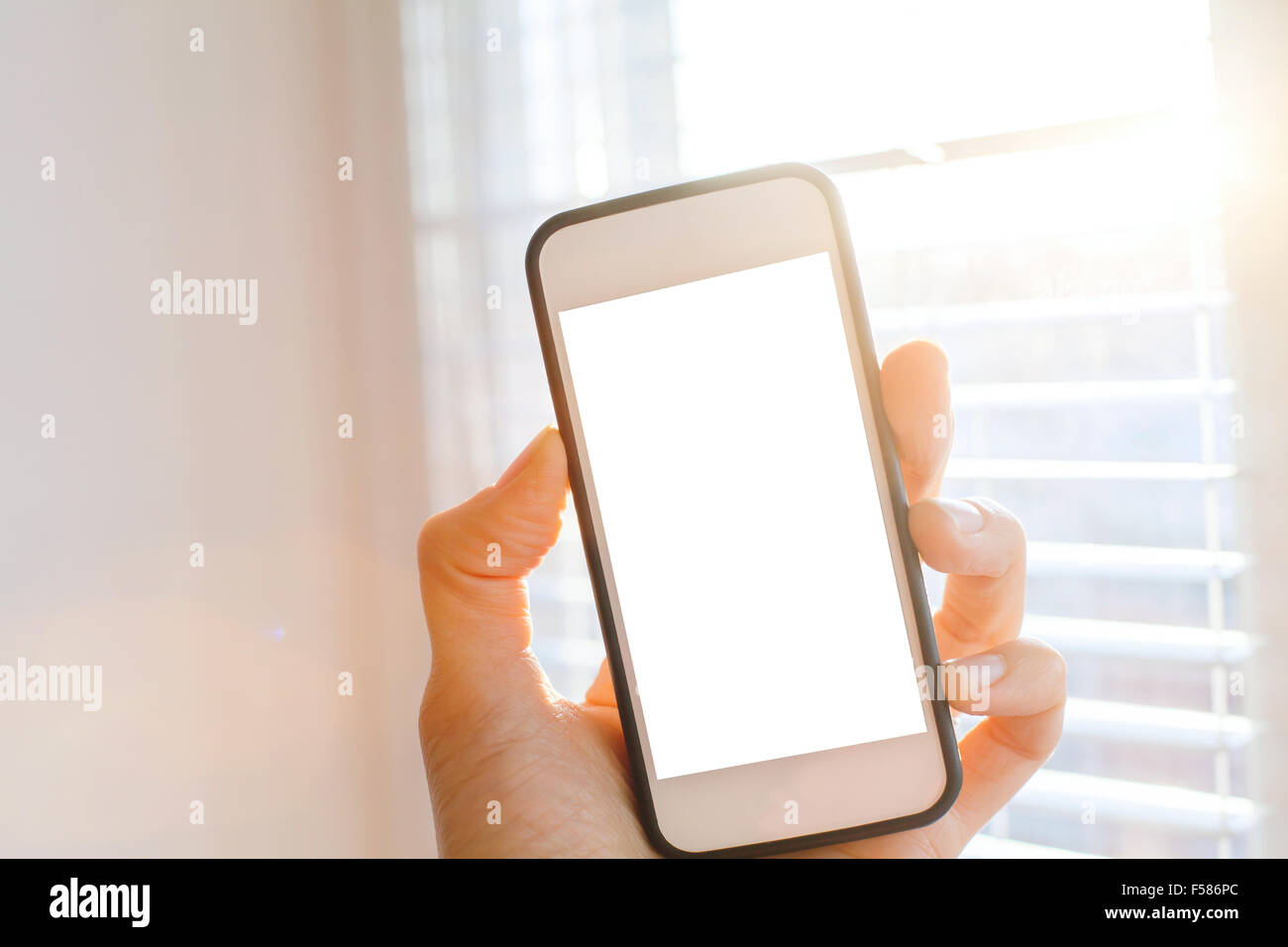 smartphone in the hand Stock Photo - Alamy