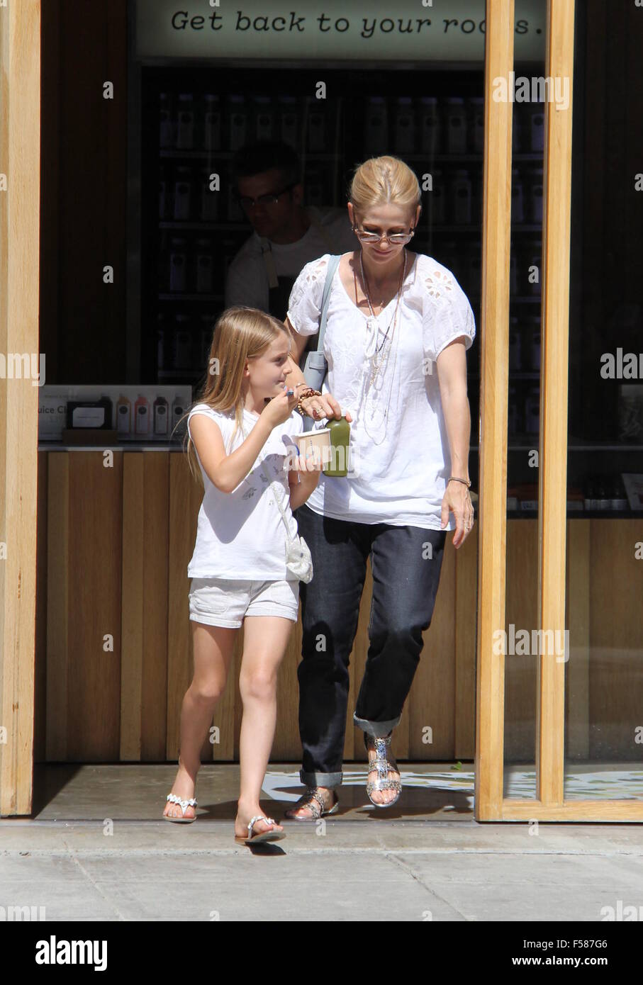 Kelly Rowan picks up refreshments from Pressed Juicery with her ...