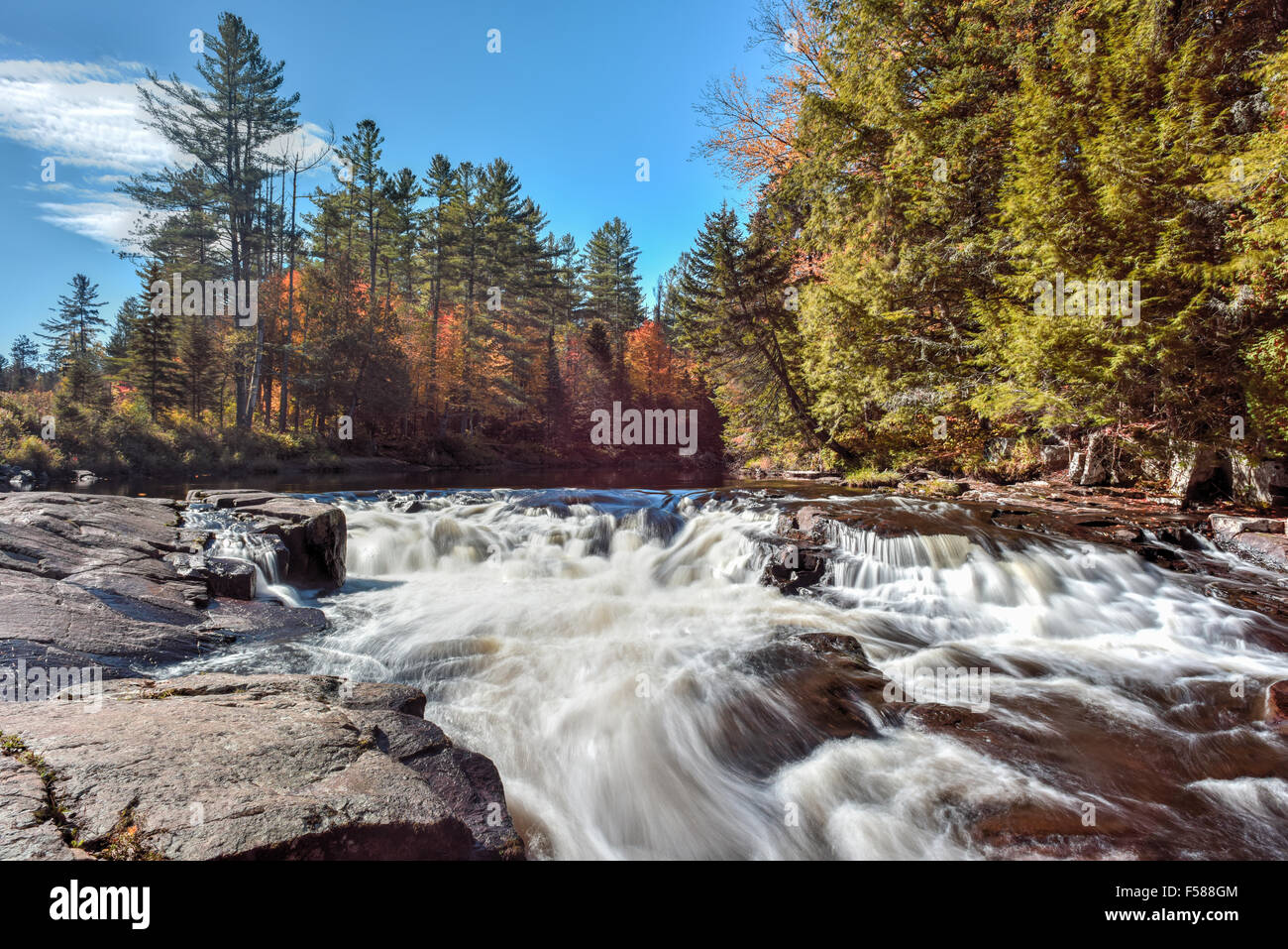 Adirondacks Peak Fall Foliage alongside Monument Falls, New York Stock ...